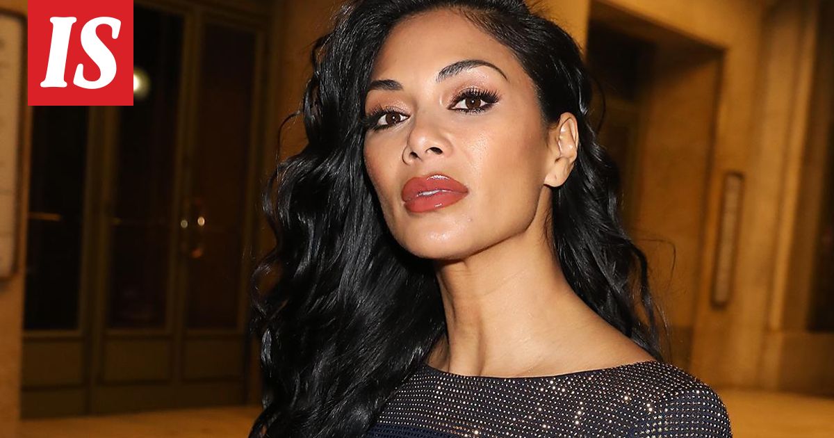 Laulaja Nicole Scherzinger poseerasi uhanalaisten ja kahlittujen ...